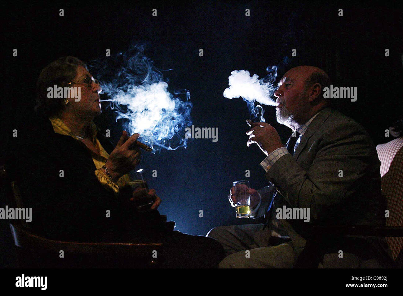 Lord pendry and baroness trumpington enjoy their cigars hi-res stock ...