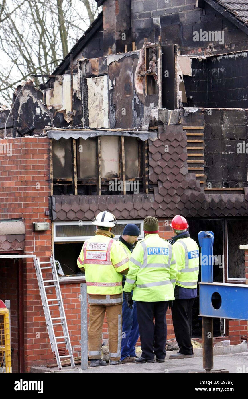 Police demolition workers at the devastated house in hillside road hi ...