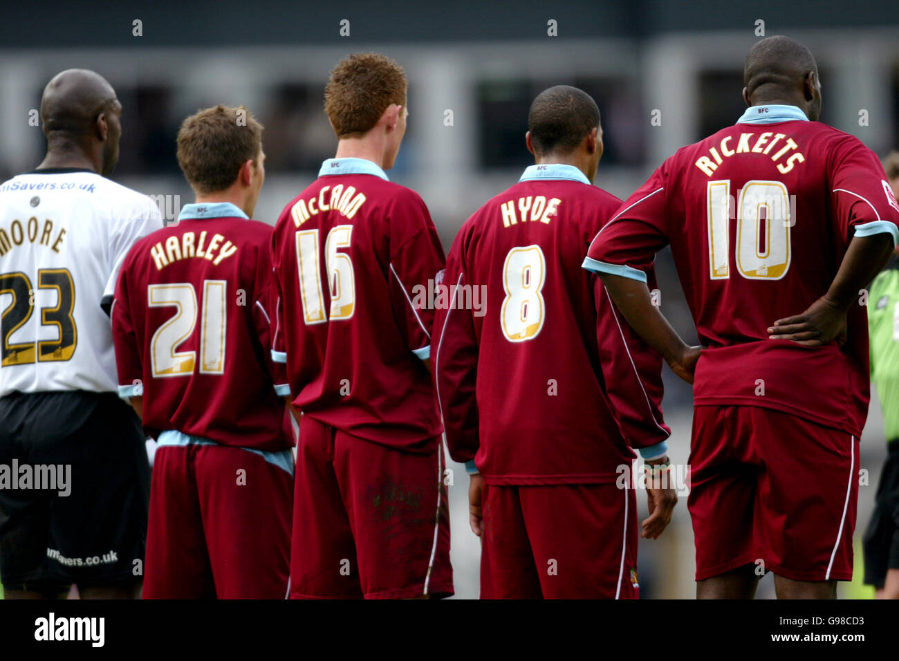 (From l-r) Derby County's Darren Moore stands in the wall with Burnley ...