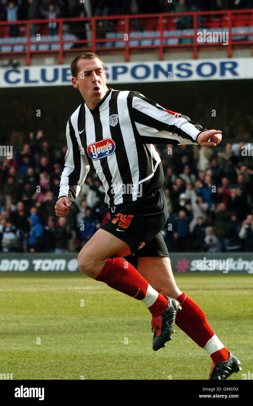 Grimsby's Gary Jones celebrates after opening the scoring during the ...
