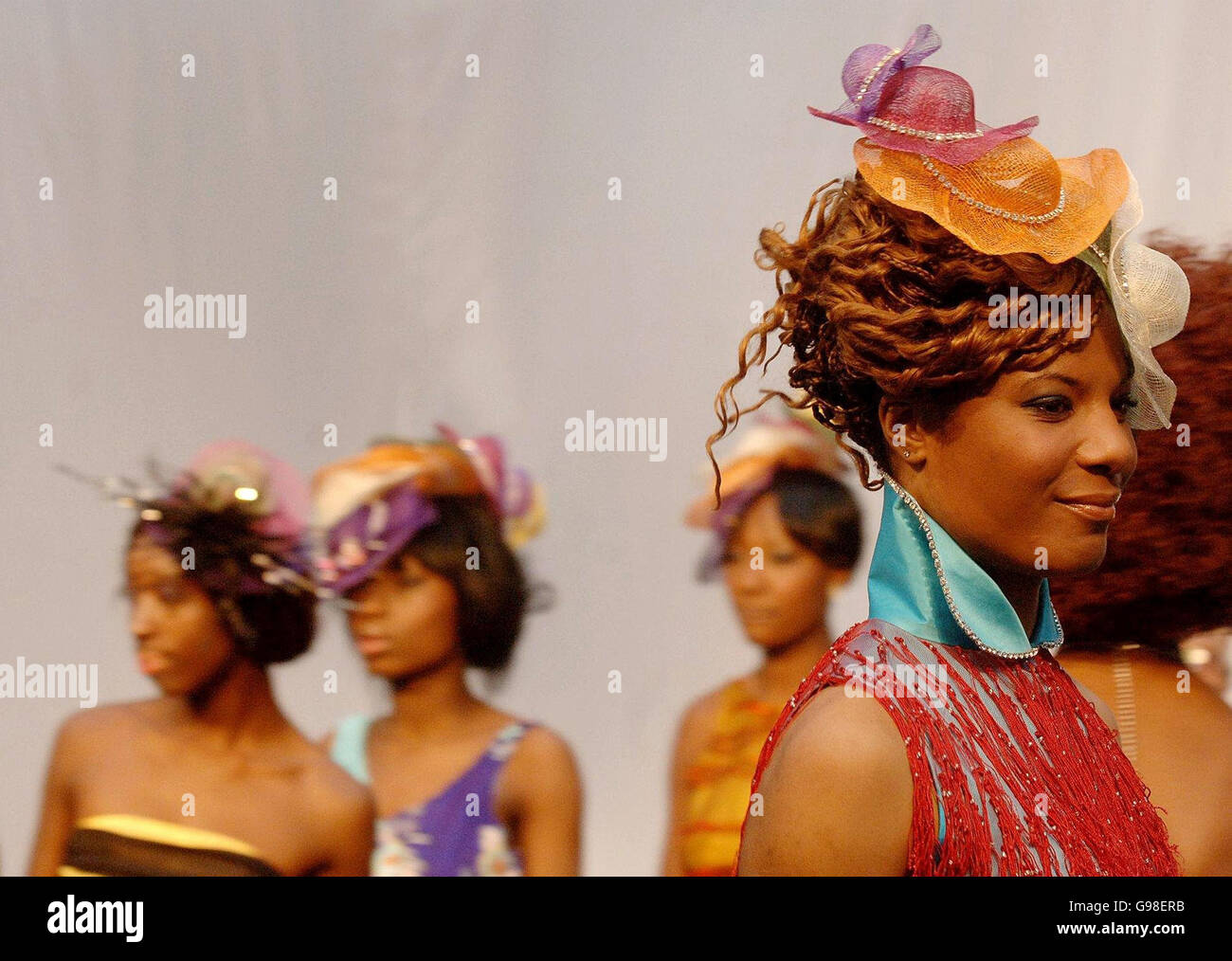 Models wear designs by Steven Sin Kim Wae, during a catwalk show for ...