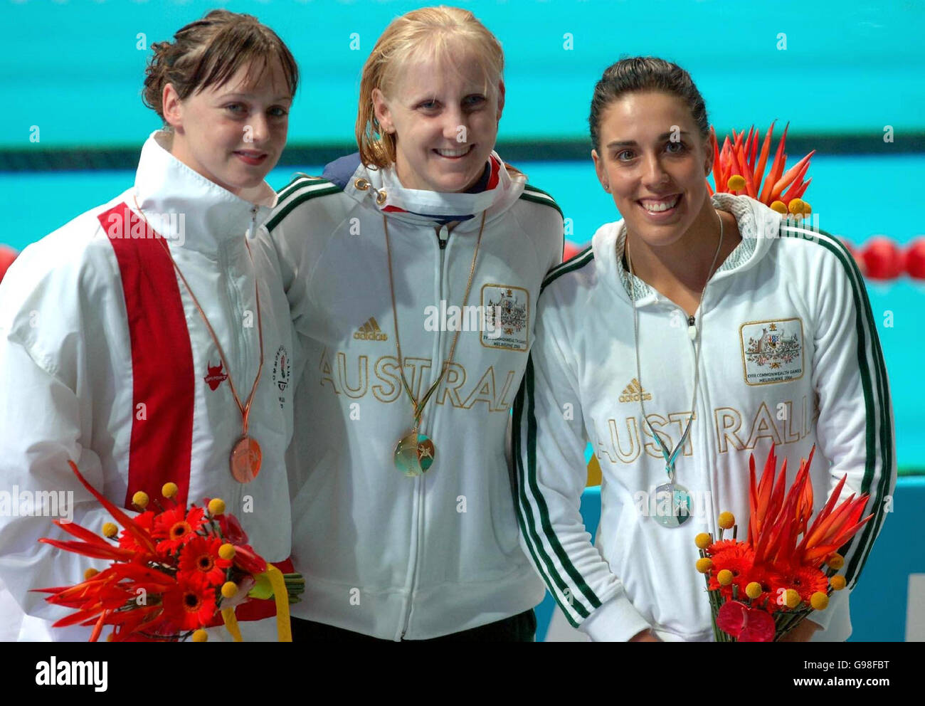 England's Terri Dunning (L) celebrates winning a bronze medal in the ...
