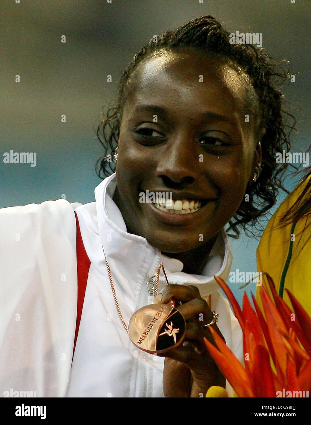 England's Nadia Williams shows off her bronze medal she won in the ...