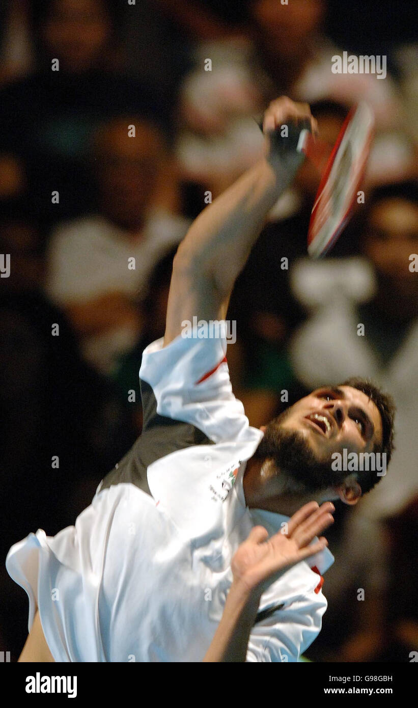 England's Aamir Ghaffar in action against Malaysia's Chong Wei during ...
