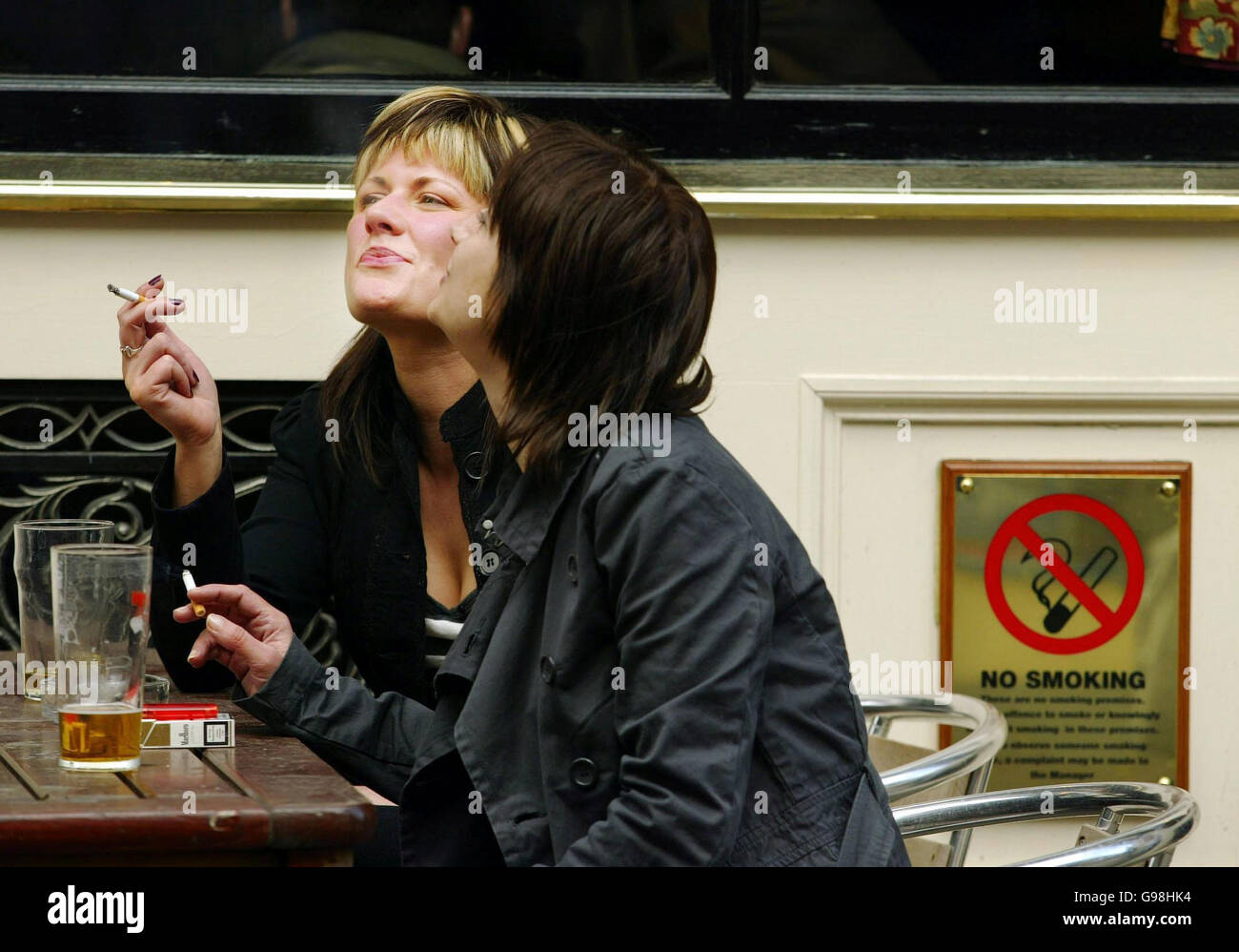 Two unidentified women outside a bar on Rose St Edinburgh on the first ...
