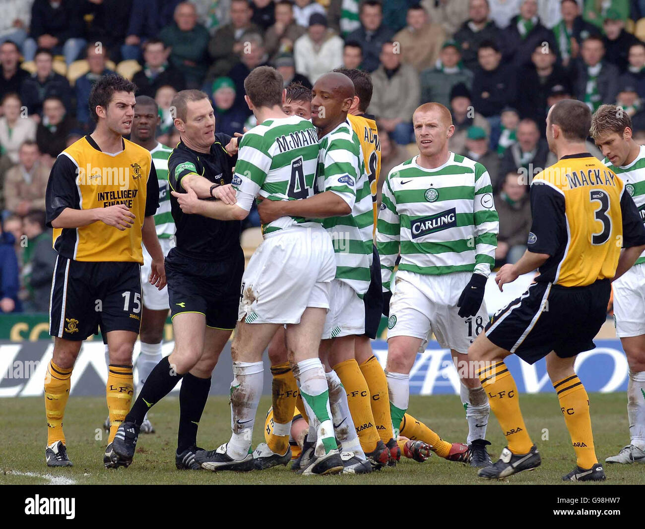 Referee Kenny Clark struggles to keep the players apart during the Bank ...