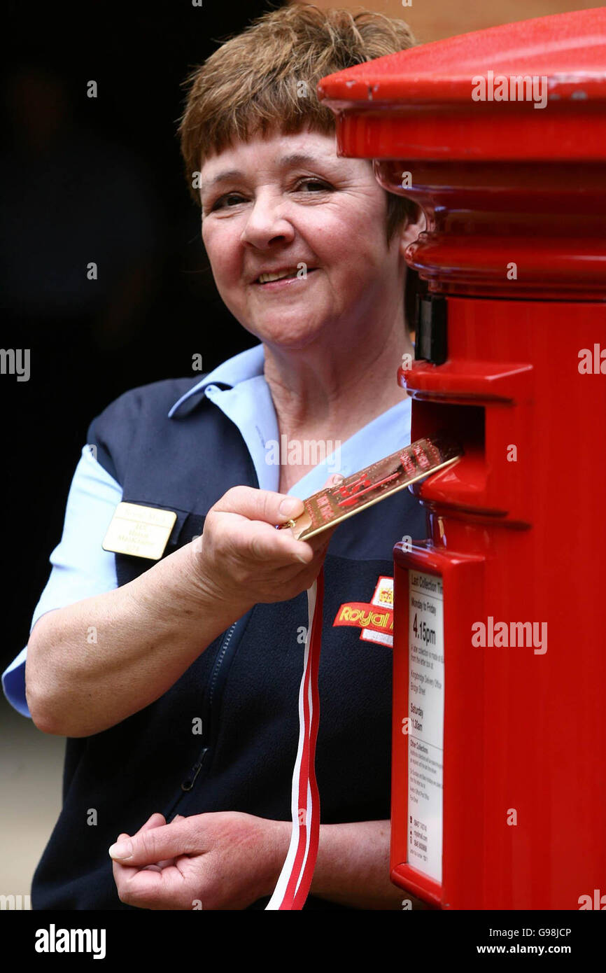 Helen MacKenzie 'posts' her Royal Mail Postie of The Year award in ...