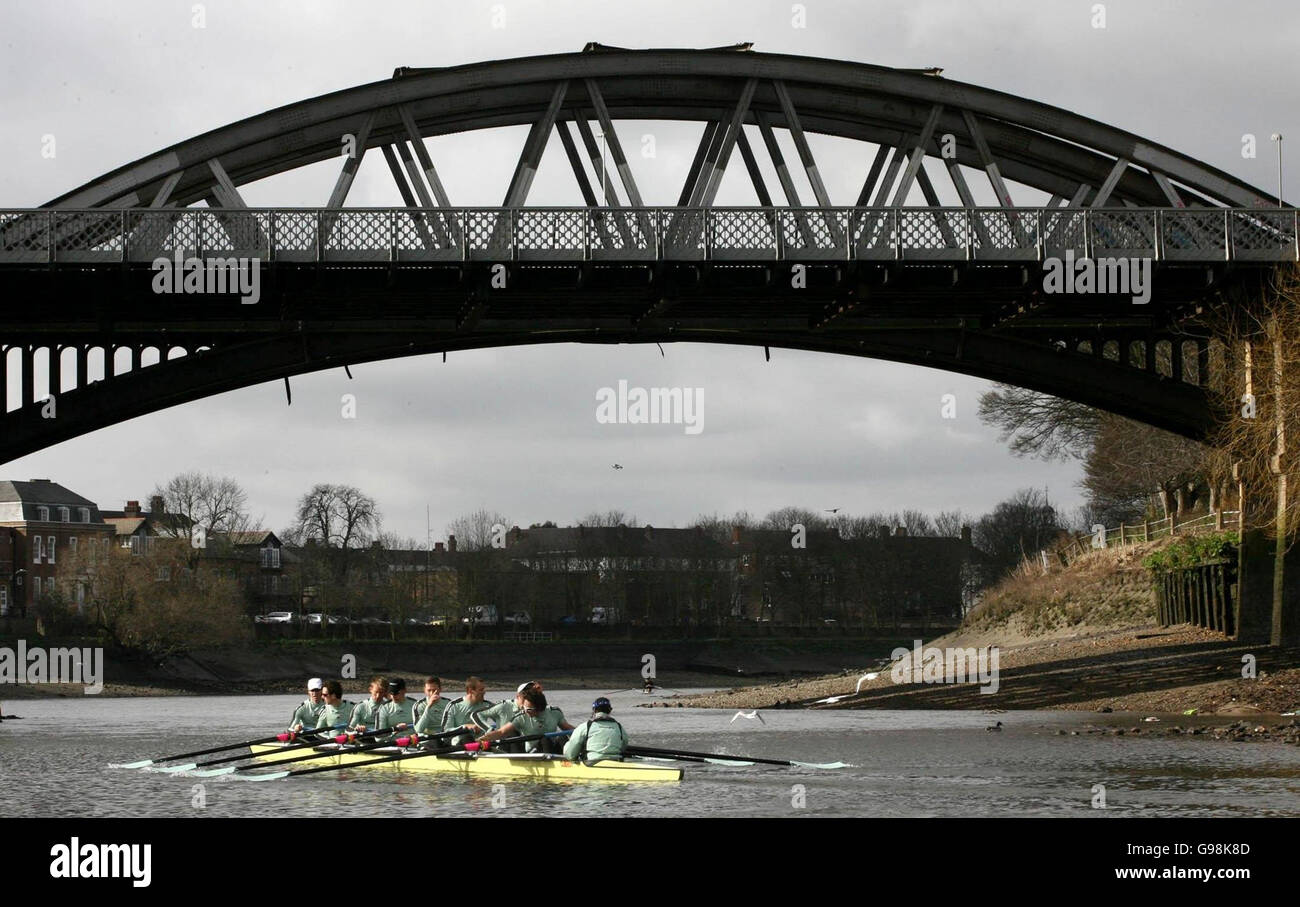 The Cambridge University boat crew pass under Barnes Bridge during a ...