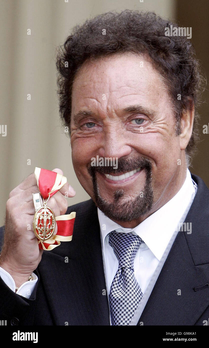 Singing legend Tom Jones displays the knighthood he received from ...