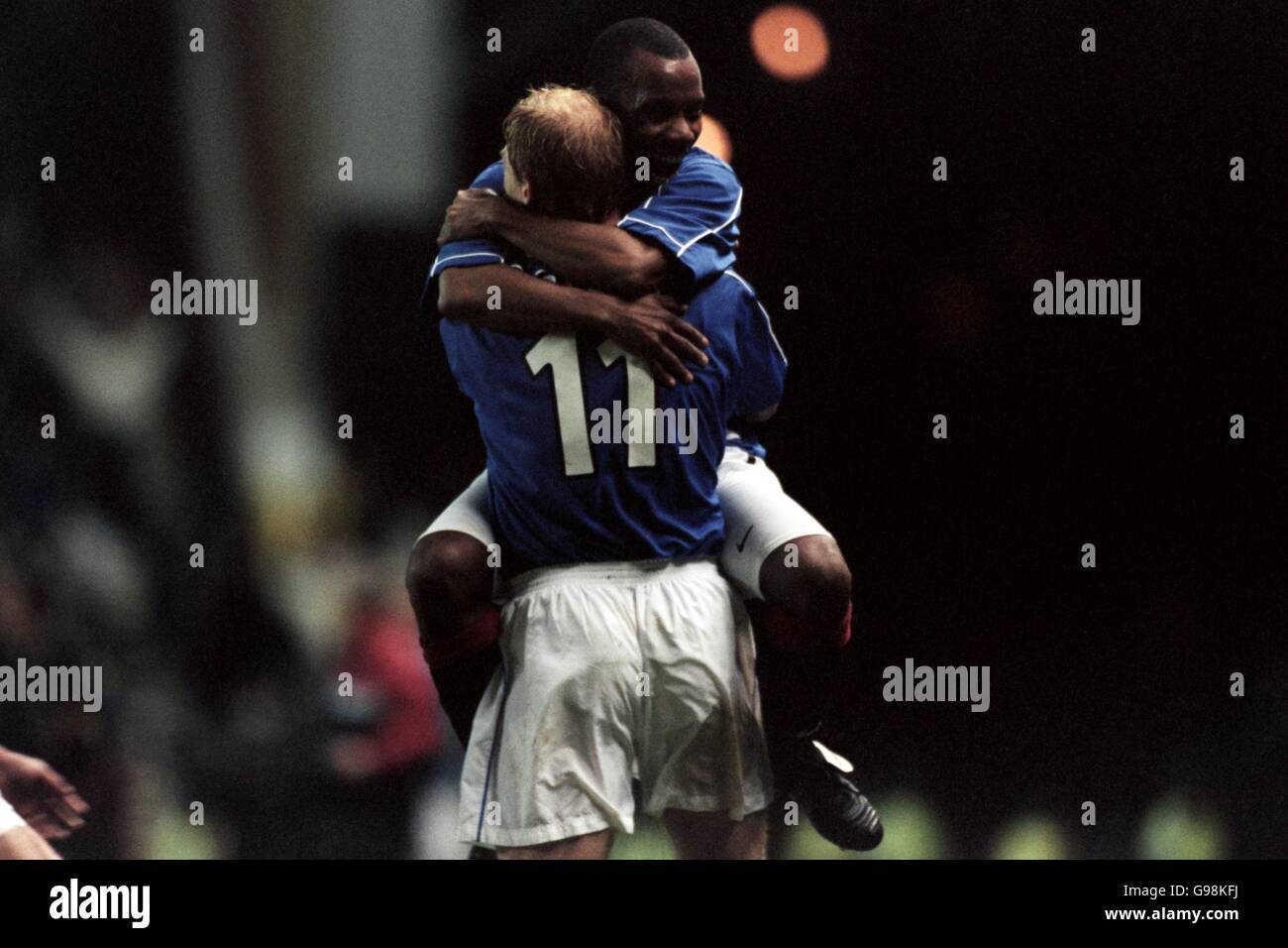 Rangers' Rod Wallace celebrates with team mate Jorg Albertz after ...