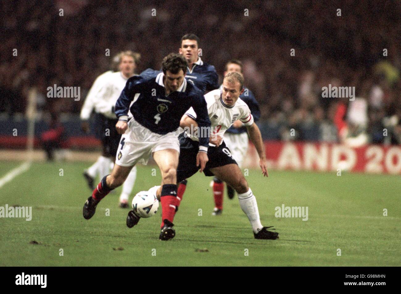 Englands alan shearer right takes on scotlands christian dailly left hi ...