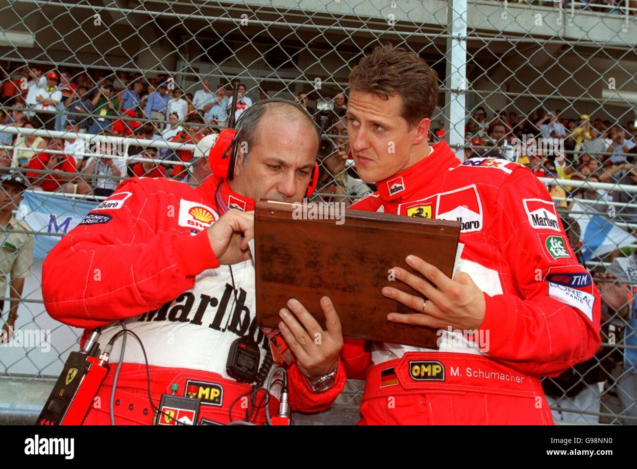 Formula One Motor Racing - Malaysian Grand Prix. Michael Schumacher (R ...