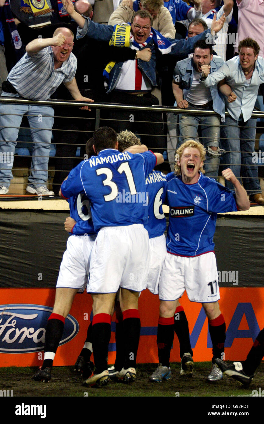 Rangers' Peter Lovenkrands celebrates scoring with his team mates Stock ...