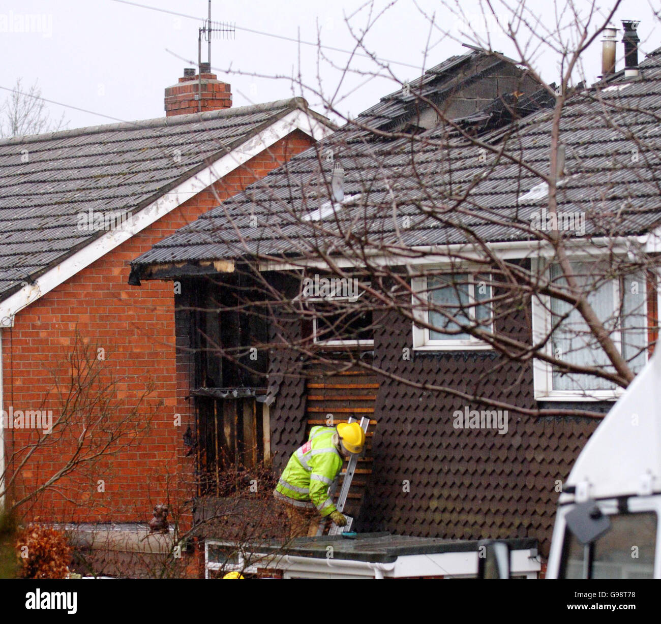 Emergency service personnel at the house Friday March 10, 2006, in ...