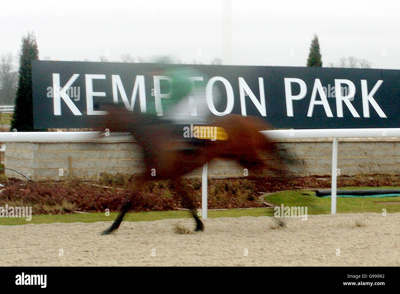 Horses Flash Past The Finishing Post At Kempton Park High Resolution ...