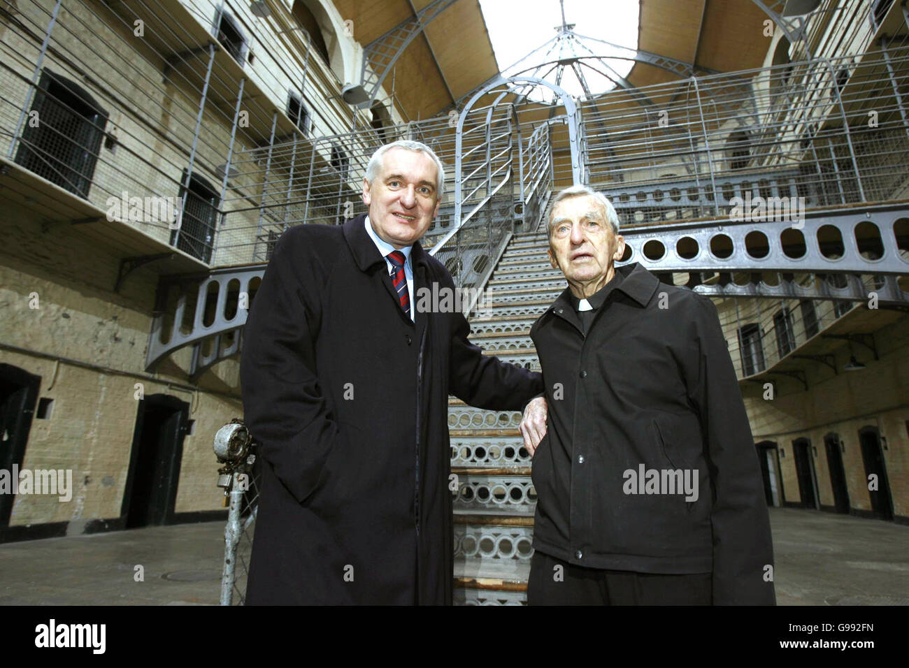 Taoiseach Bertie Ahern stands with Father Joseph Mallin, who is the ...