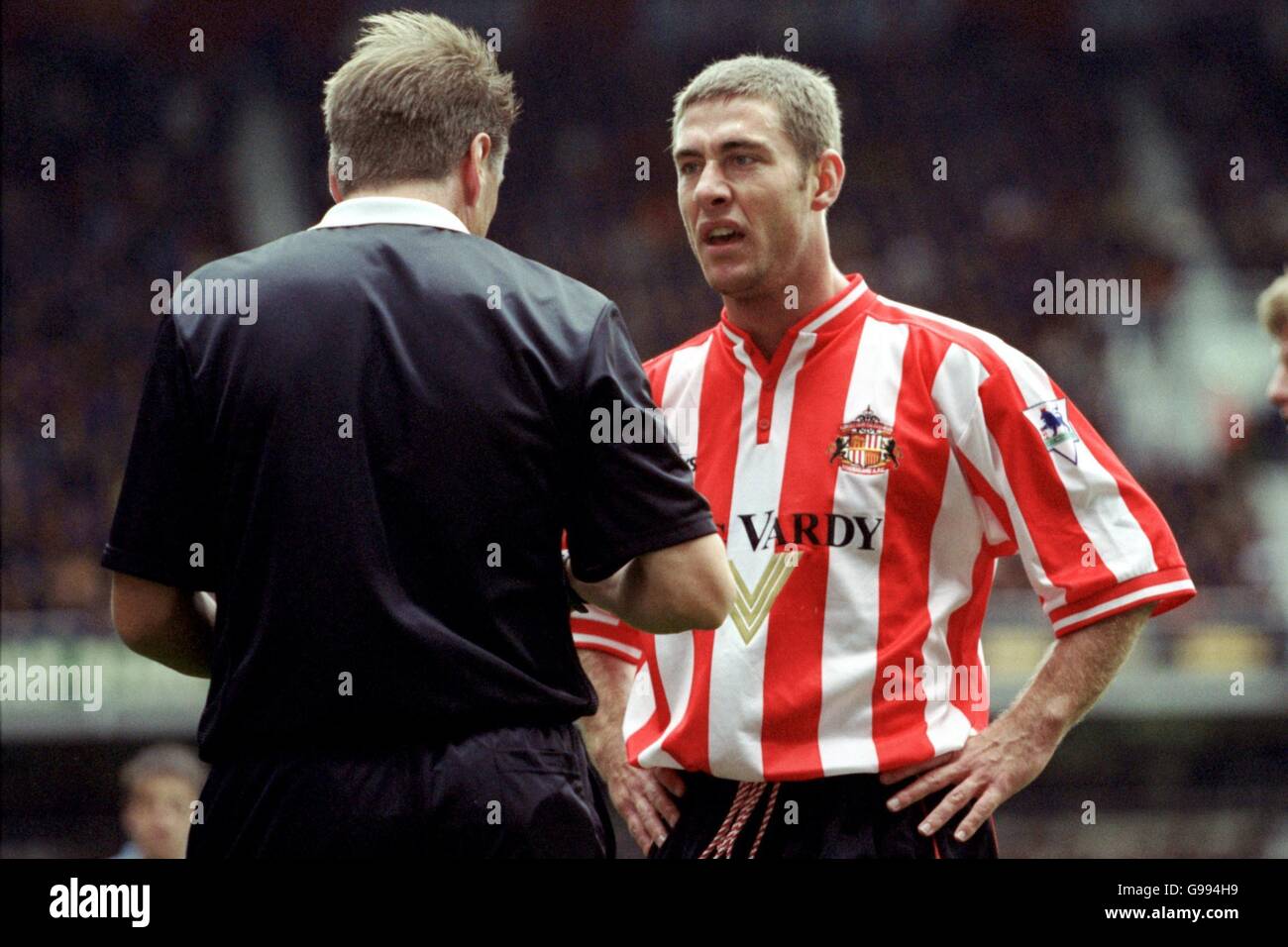 Referee Mark Halsey (left) books Sunderland's Chris Makin (right Stock ...