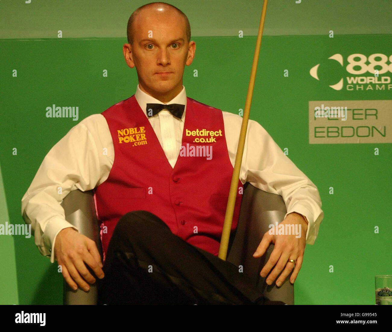 Peter Ebdon waits for Marco Fu to play a shot during the semi final ...