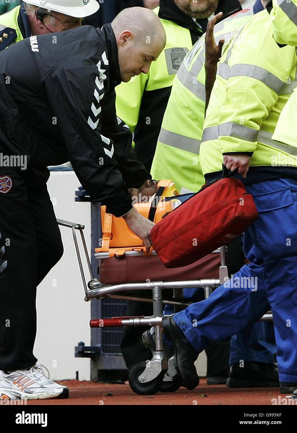 Hearts' Jose Goncalves is stretchered off during the Tennents Scottish ...