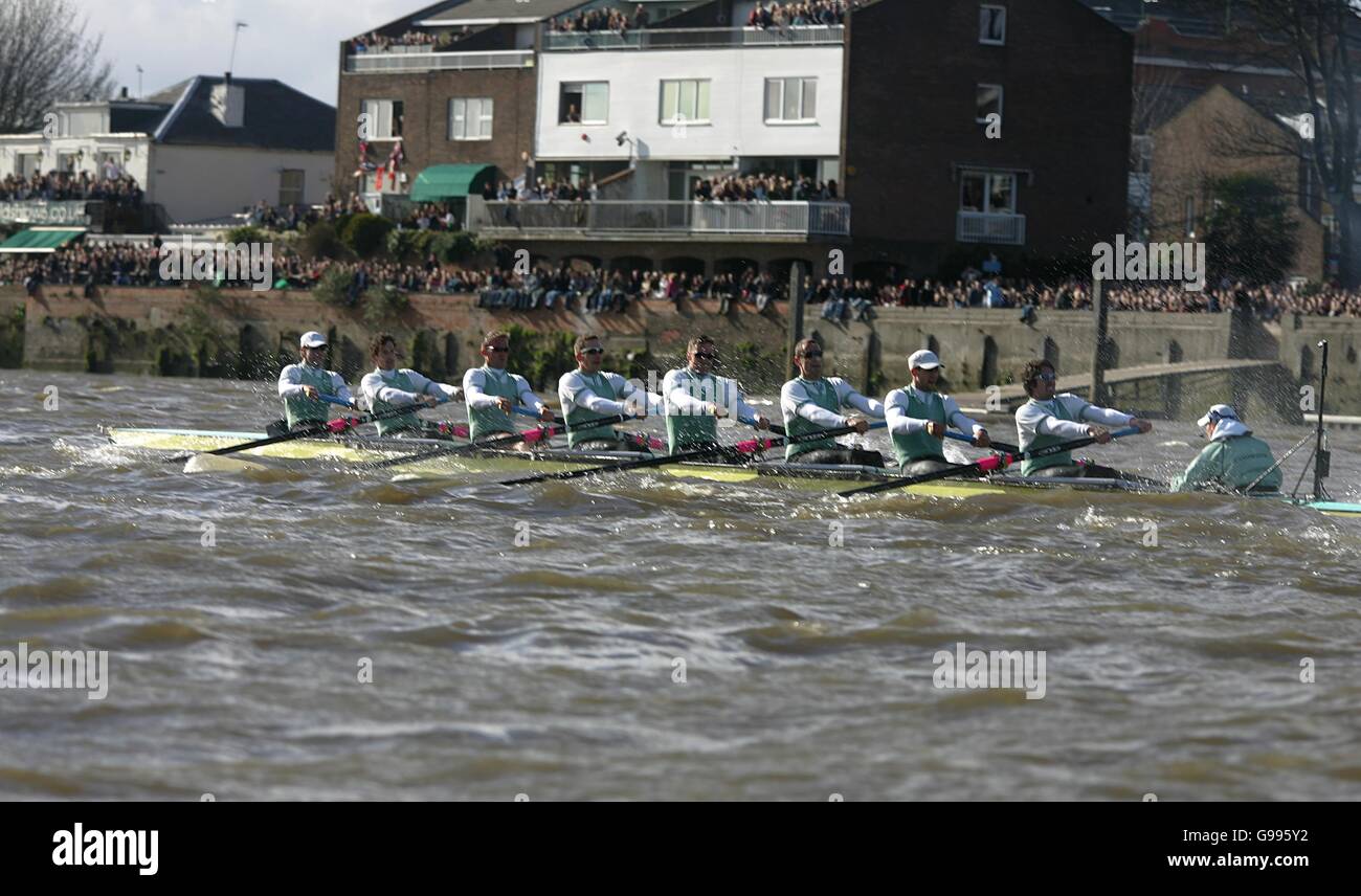 Cambridge crew find the going hard work as the boat sits low in the ...