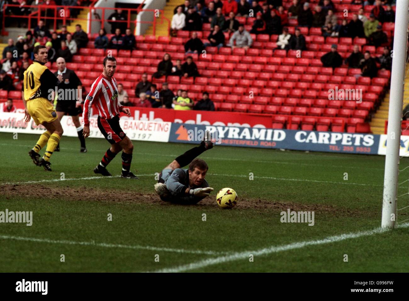 Sheffield United Keeper Simon Tracey lets the ball slips past him for ...