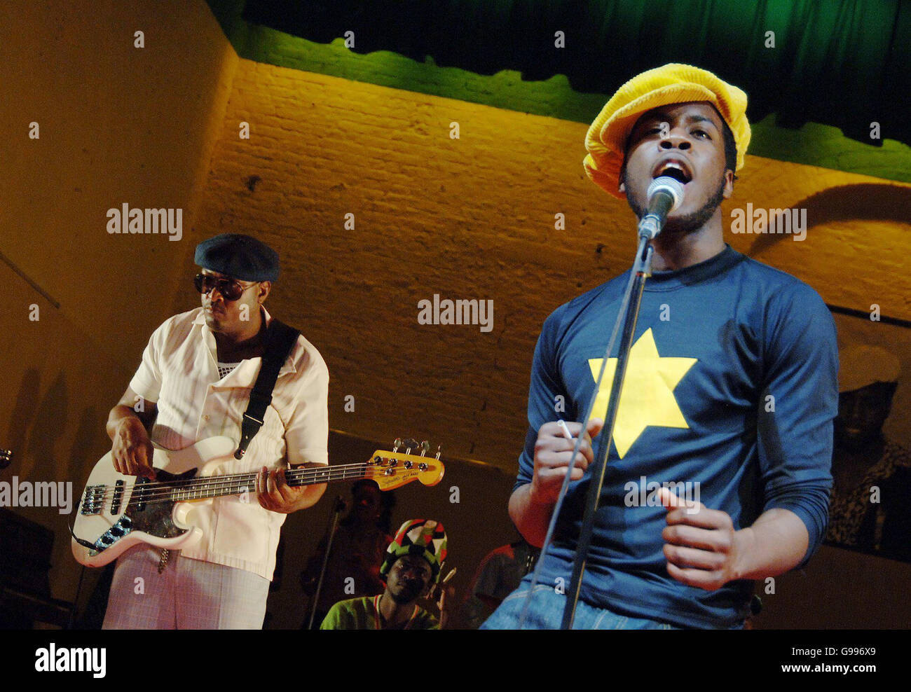 Wayne Nunes (on bass guitar) and Rolan Bell (who stars as Ivan) in the ...