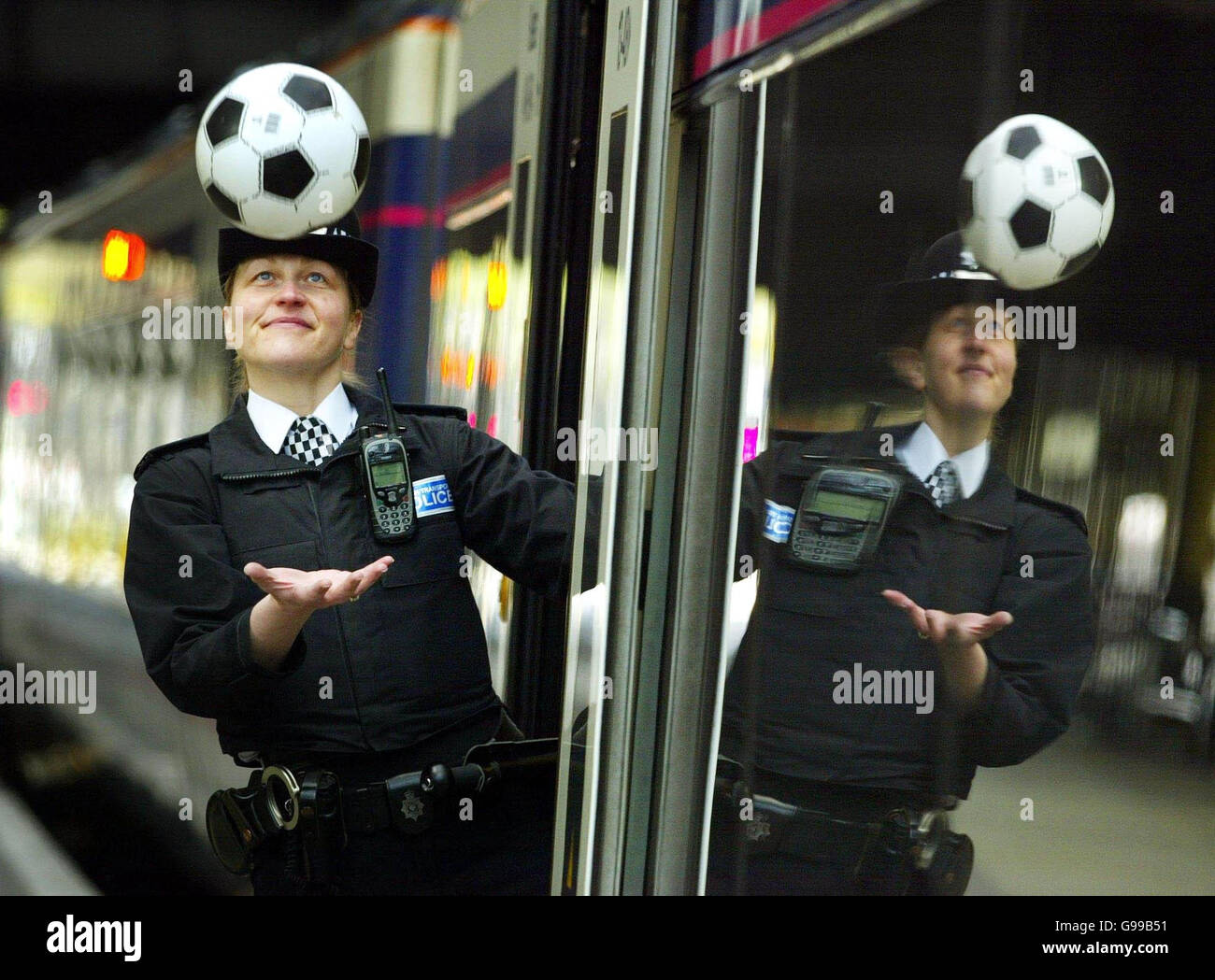 Smiling police football hi-res stock photography and images - Alamy