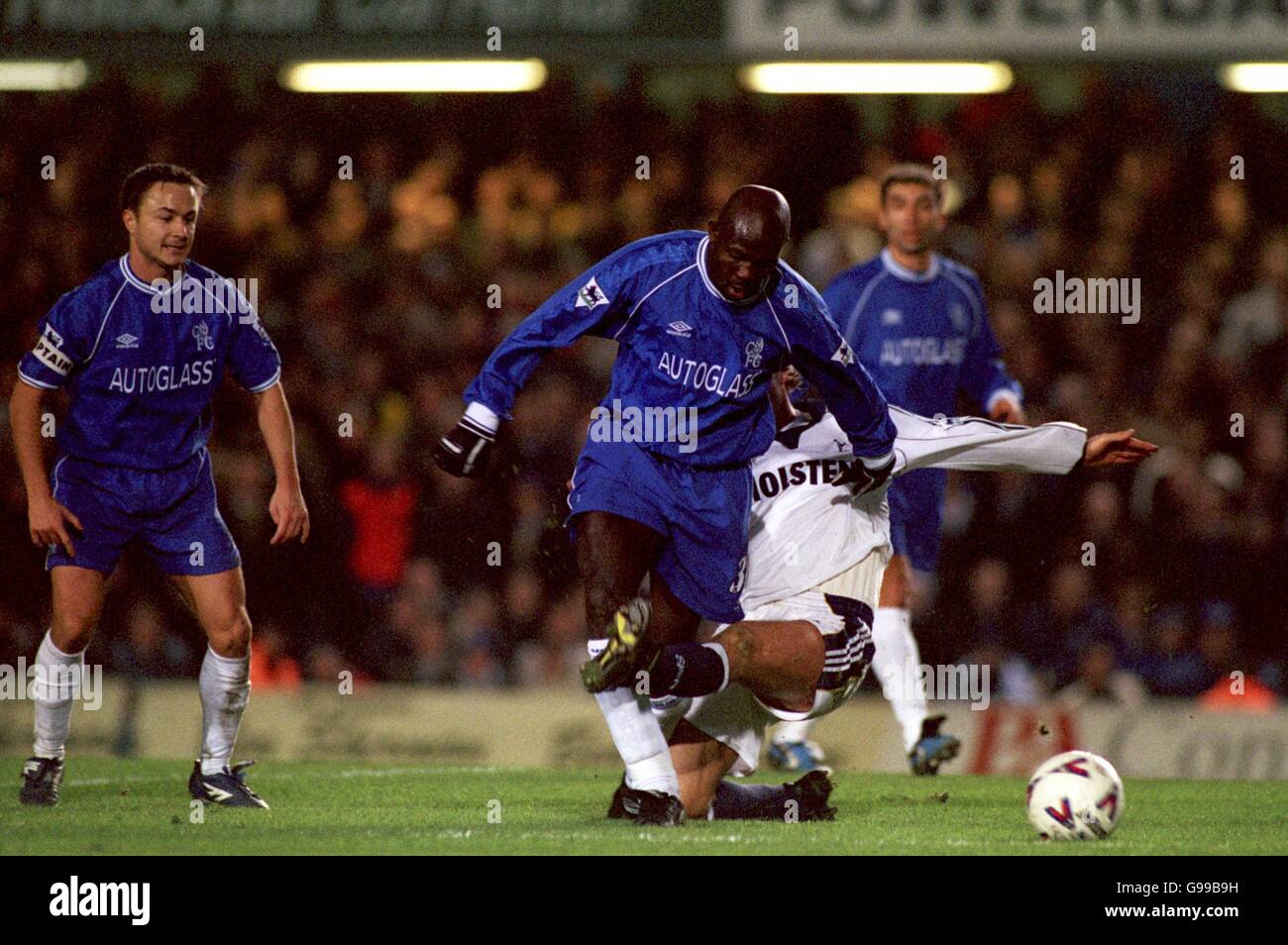 Chelsea's George Weah takes on Tottenham Hotspur's Tim Sherwood Stock ...
