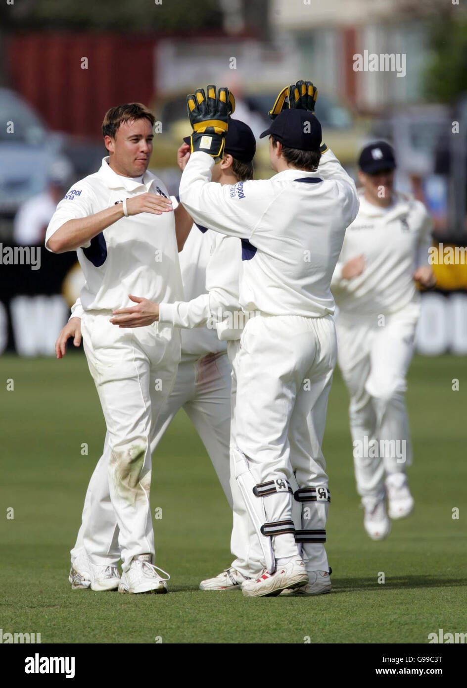 Warwickshire's Neil Carter celebrates the wicket of Sussex's Carl ...