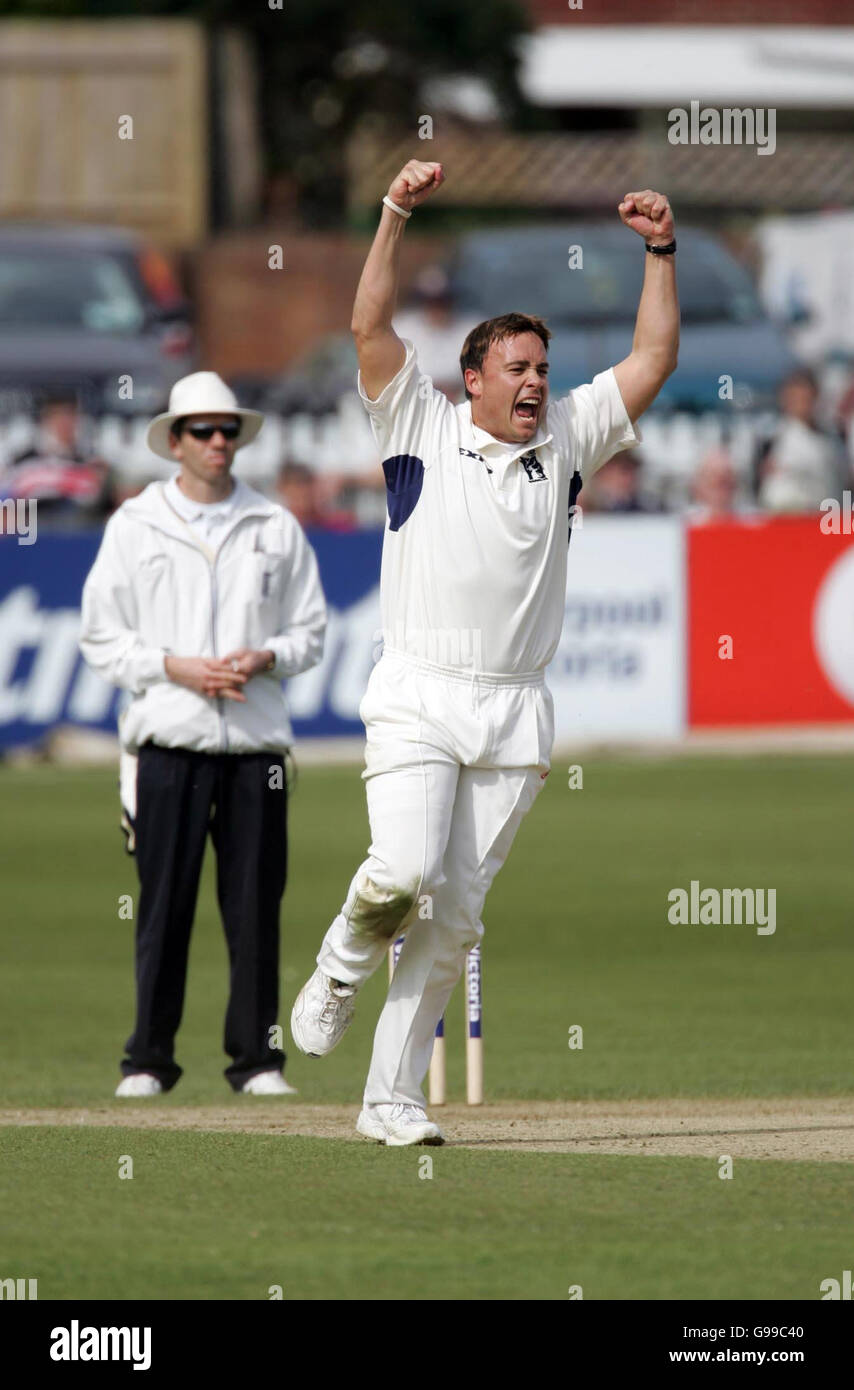 Warwickshire's Neil Carter celebrates taking the wicket of Sussex's ...