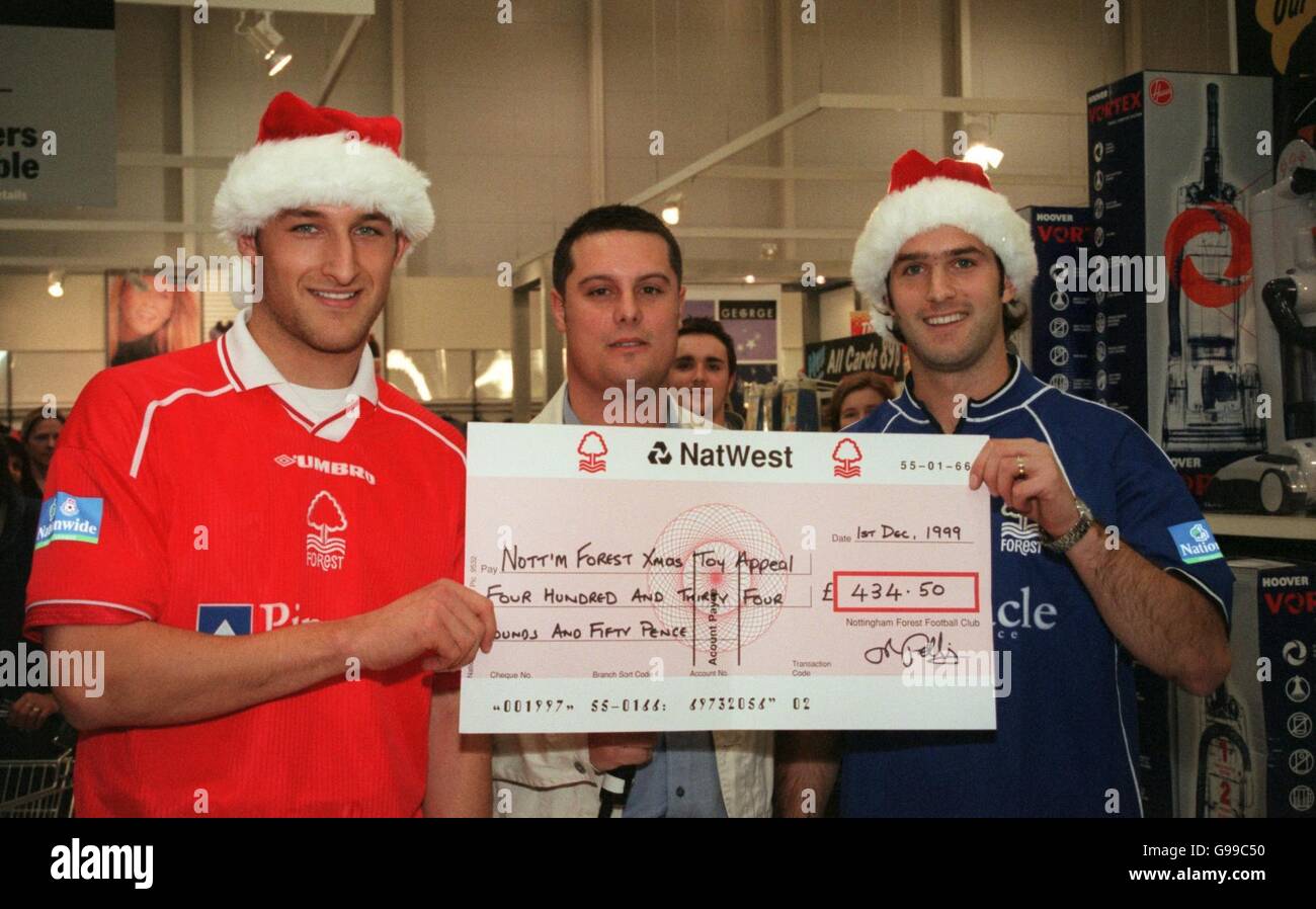 Soccer nottingham forest players charity trolley dash hi-res stock ...