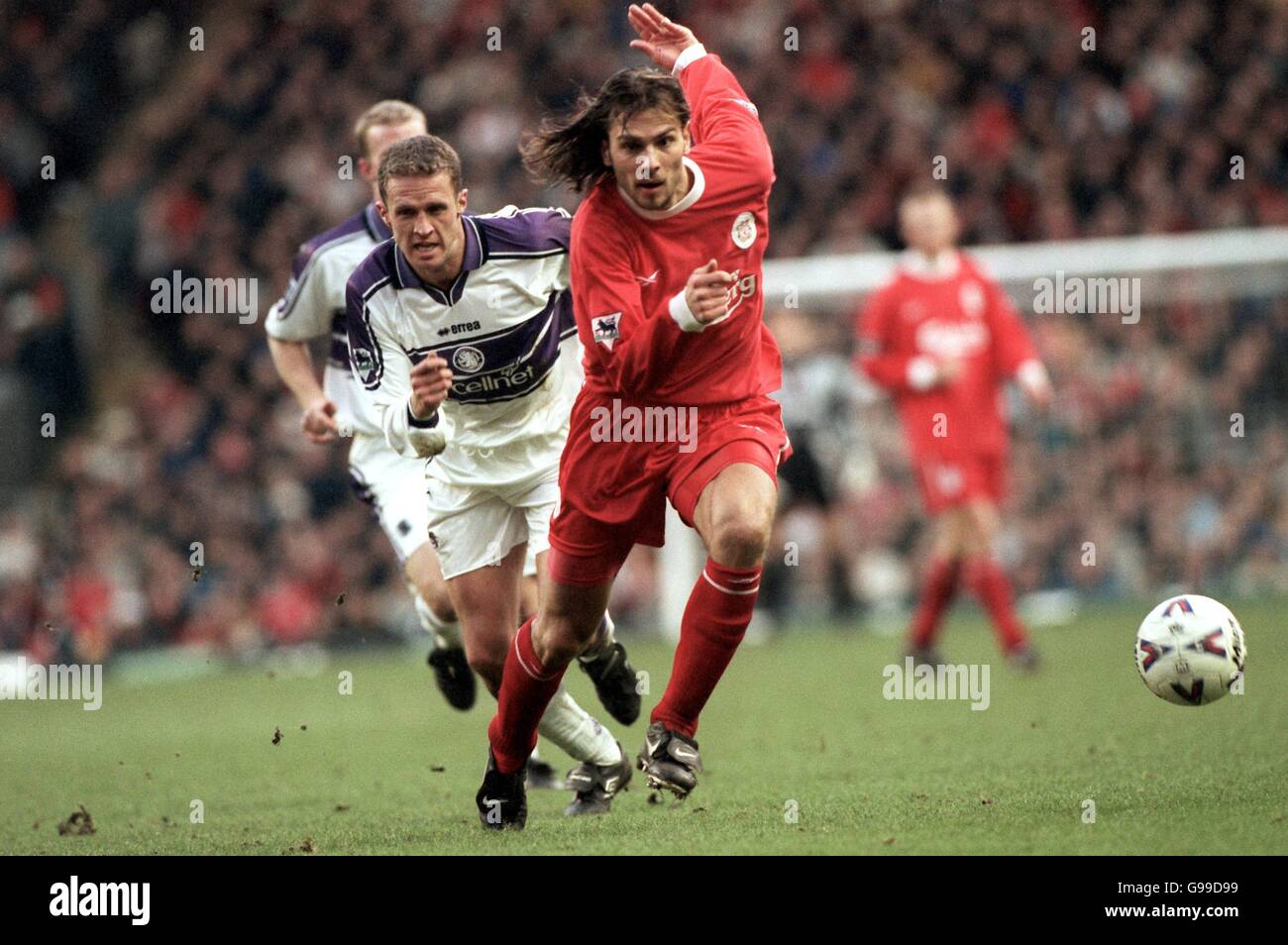 Liverpool's Patrik Berger (r) gets away from Middlesbrough's Steve ...