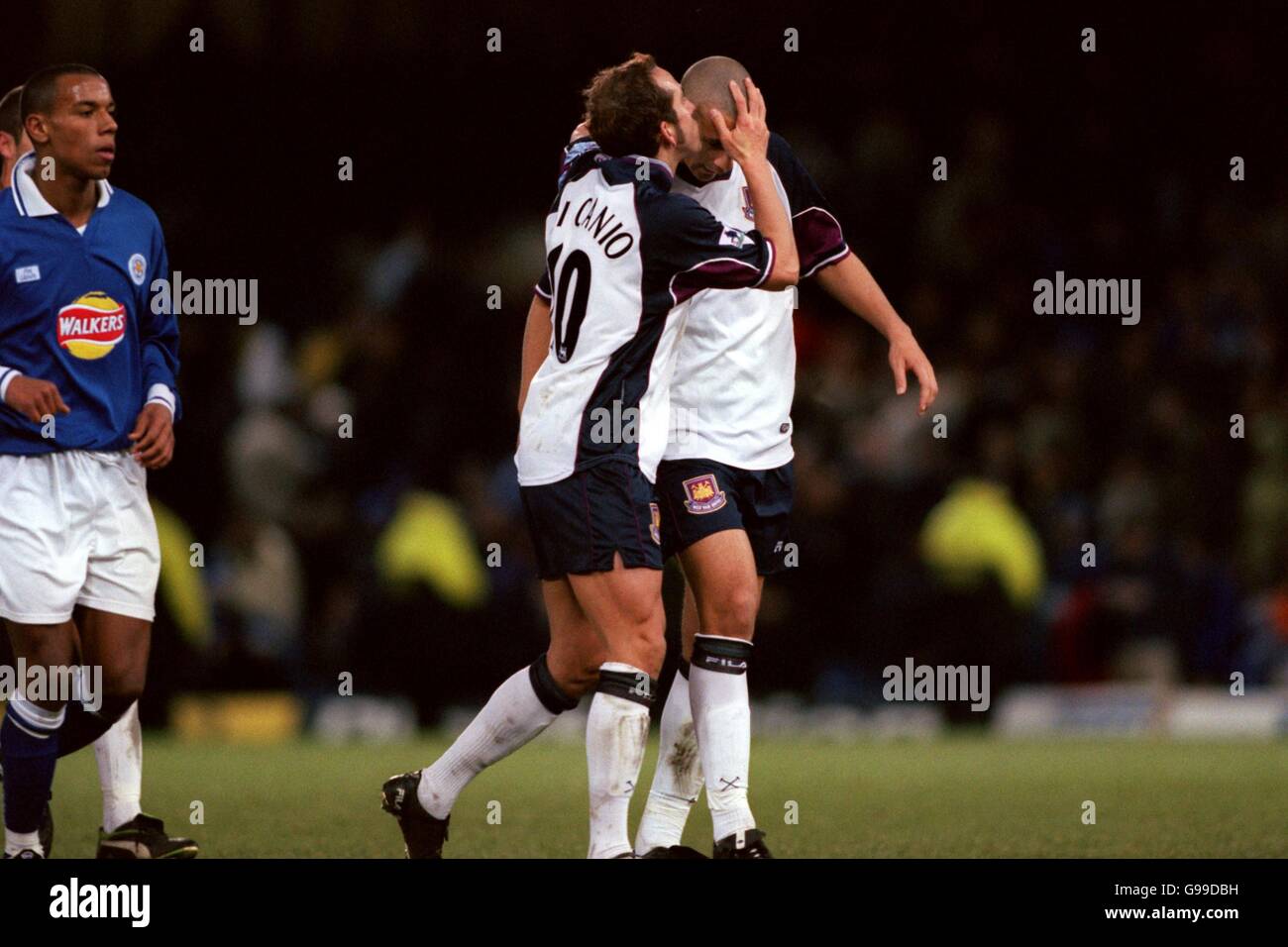 West Ham United's Paolo Di Canio (l) kisses teammate Rio Ferdinand (r ...