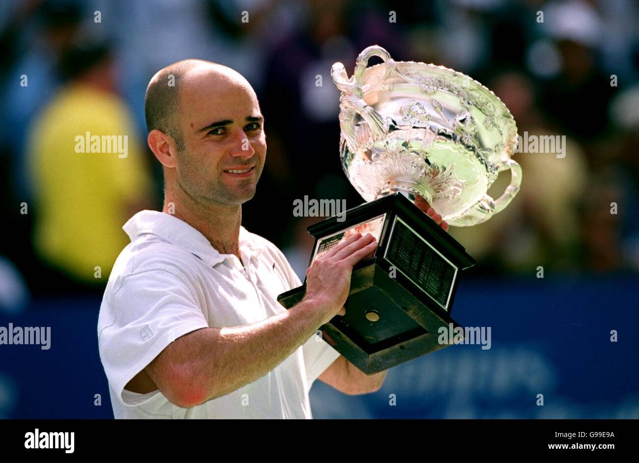 Andre agassi lifts the australian open trophy hi-res stock photography ...