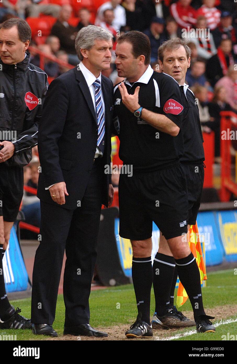 Blackburn Rovers manager Mark Hughes is spoken too by referee Rob ...
