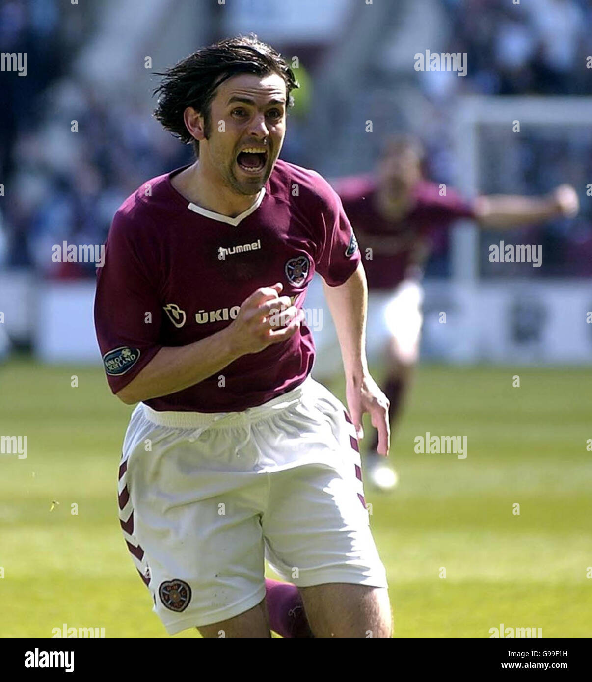 Hearts' Paul Hartley celebrates his second goal against Celtic during ...