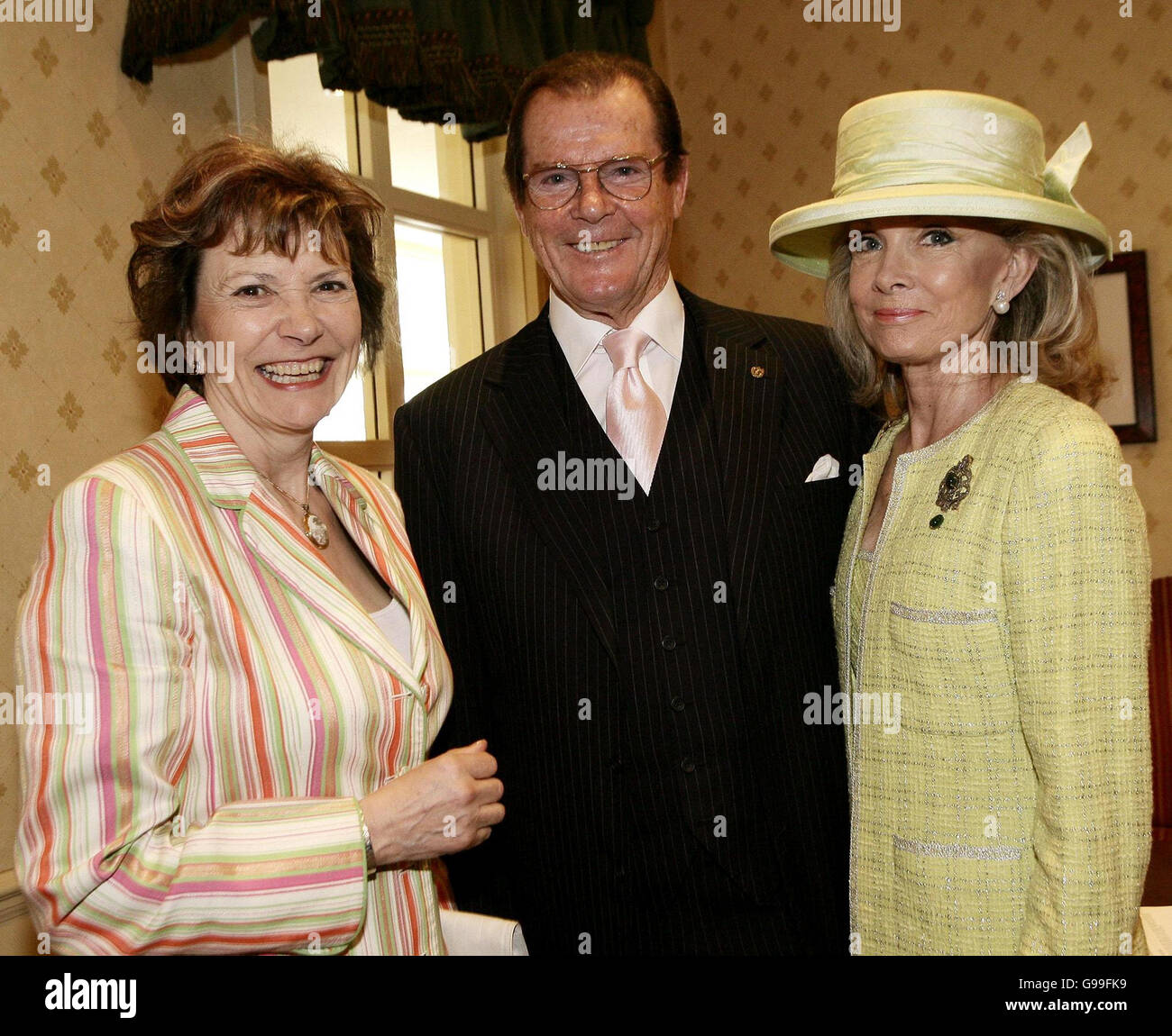 (Left to Right) Joan Bakewell, Sir Roger Moore and his wife Lady Stock ...
