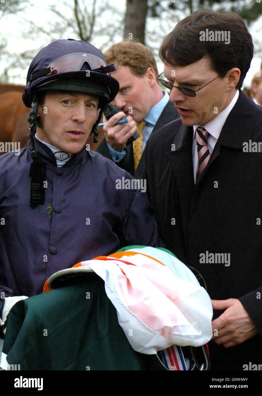 Jockey Kieren Fallon talks to trainer Aidan O'Brien after winning the ...