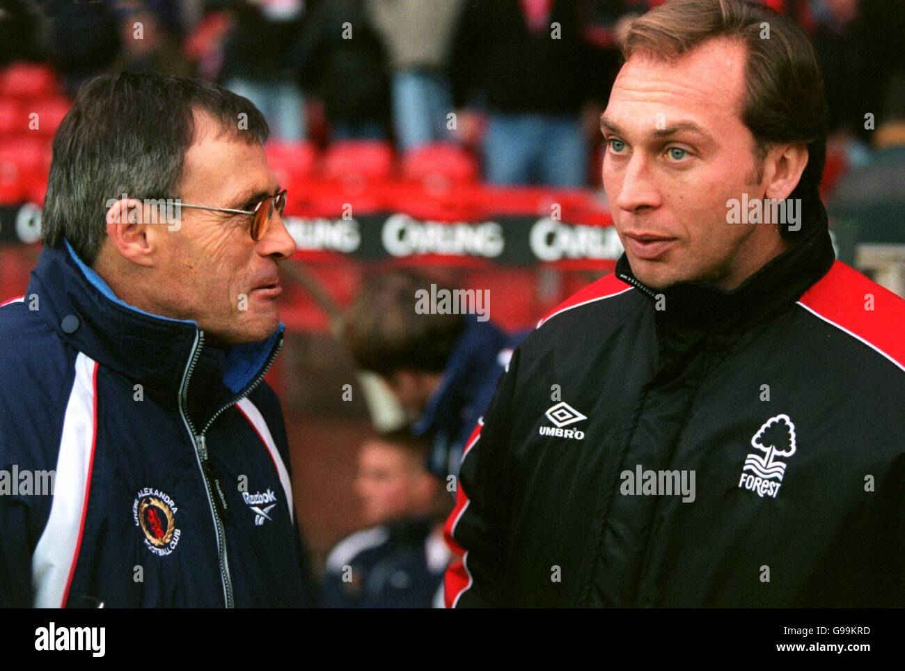 Crewe Alexandra manager Dario Gradi (left) talks to former Crewe player ...