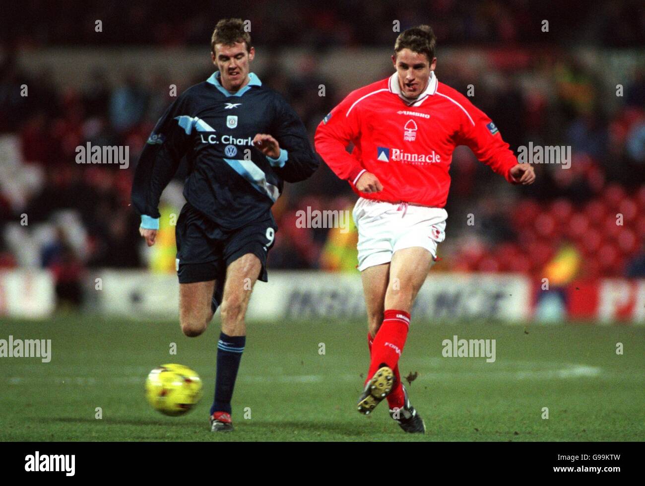 Nottingham Forest's Chris Doig (right) clears from Crewe Alexandra's ...