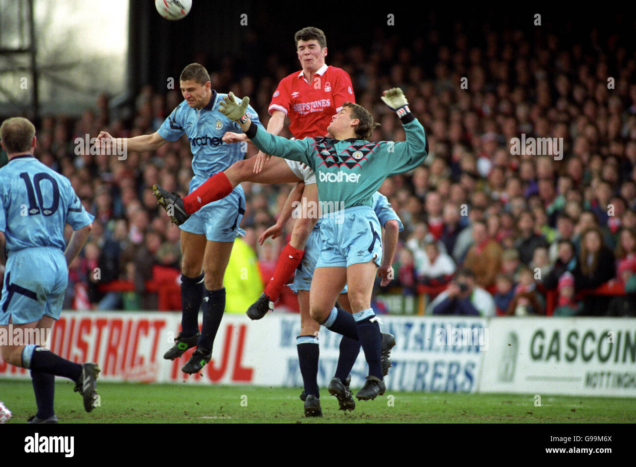 MARTYN MARGETSON (MAN C.) PUNCHES CLEAR UNDER PRESURE FROM ROY KEANE ...