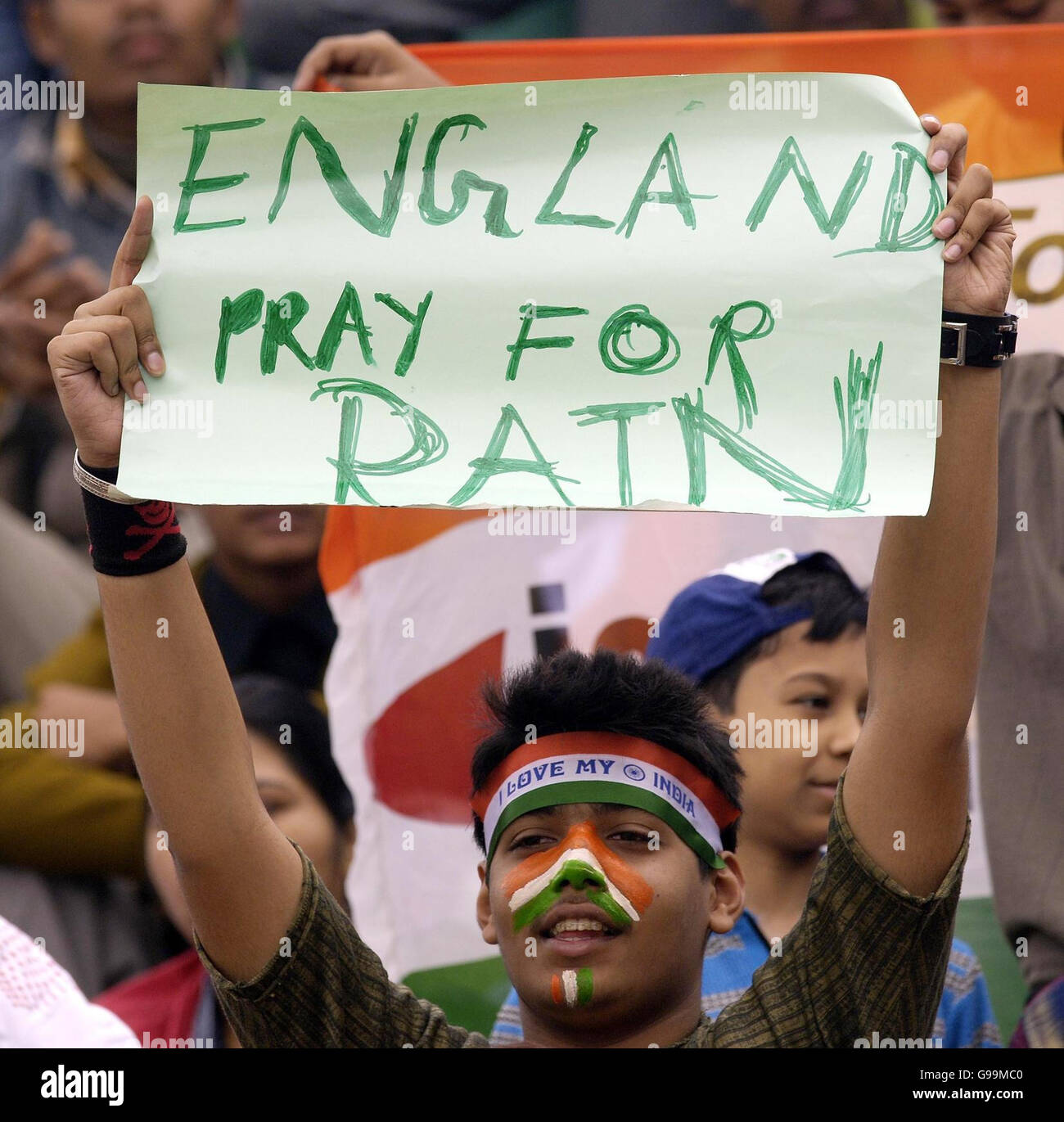 An Indian cricket fan hols a banner at the Nehru Stadium, Guwahati ...