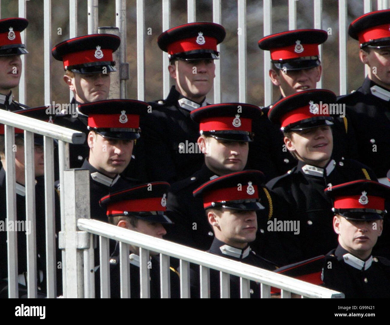 Prince William takes his place in the grandstand seating (middle row ...