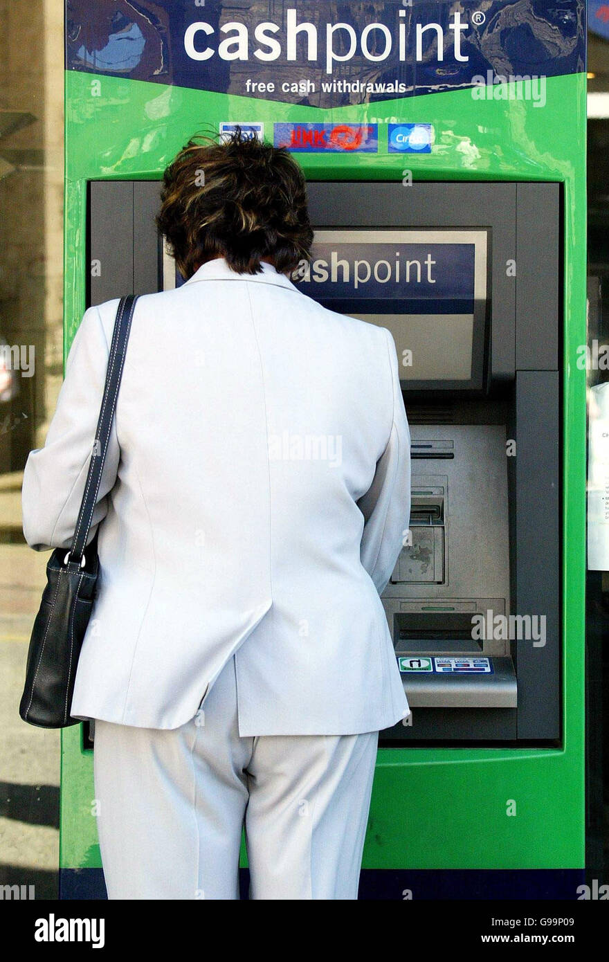 Person using a atm hi-res stock photography and images - Alamy