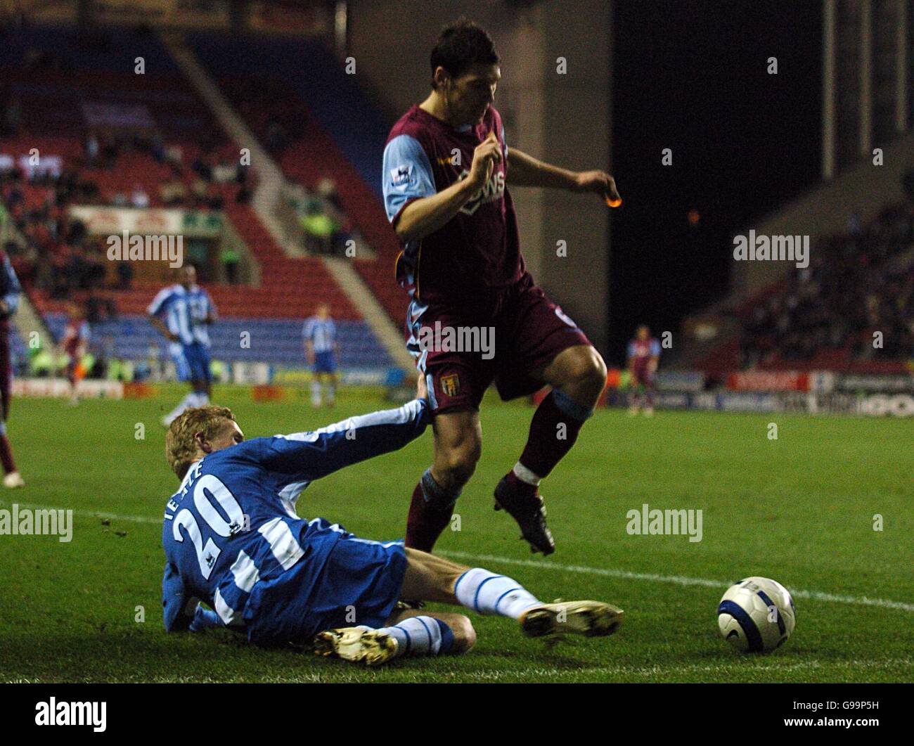 Wgian Athletic's Gary Teale tackles Aston Villa's Gareth Barry Stock ...