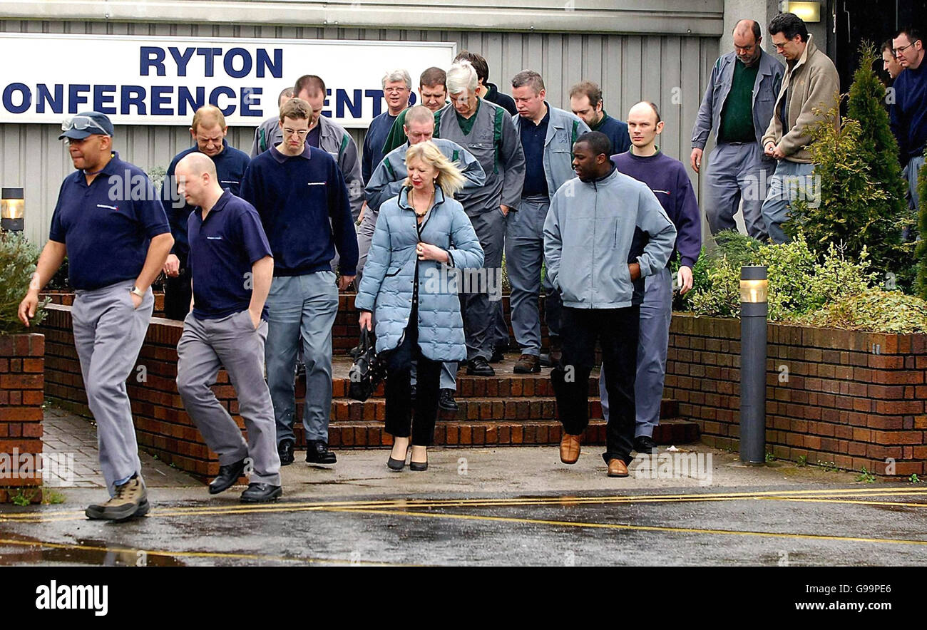 Staff leave a meeting with management at Peugeot's Ryton factory in ...