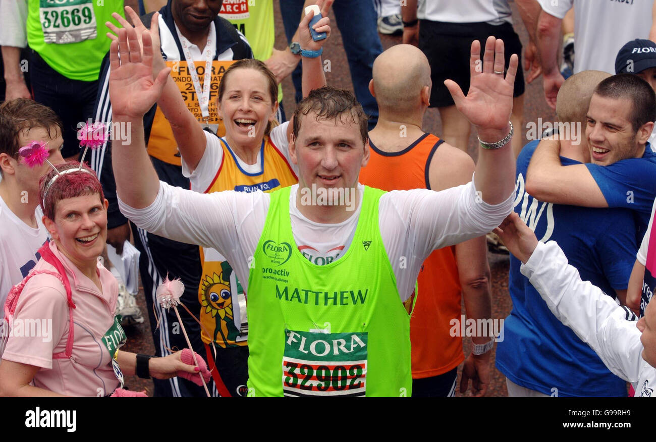 Matthew Pinsent crosses the finish at the London 2006 Marathon, in the ...