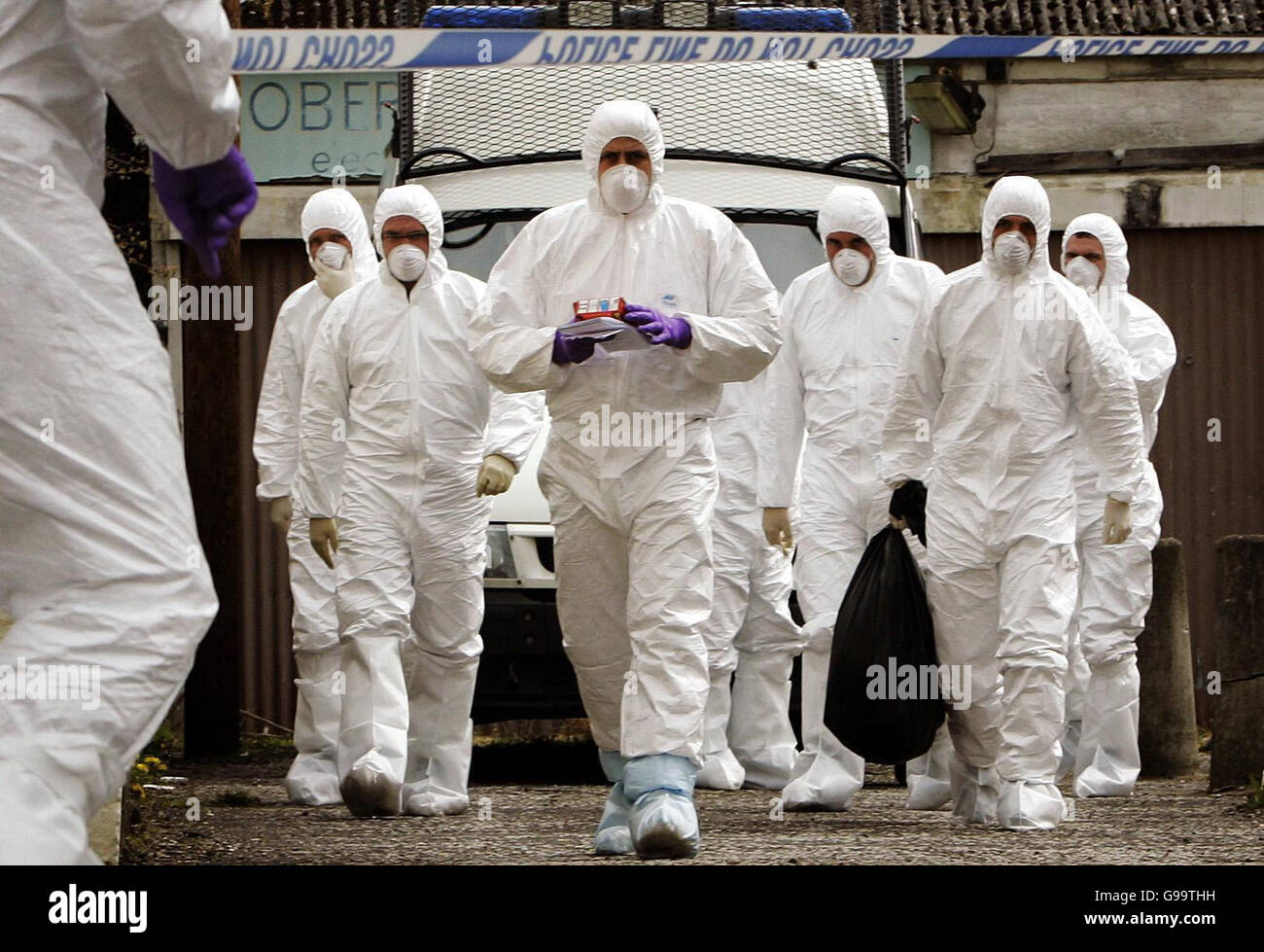 Police forensic officers outside a house in Union Street in Bridge of ...