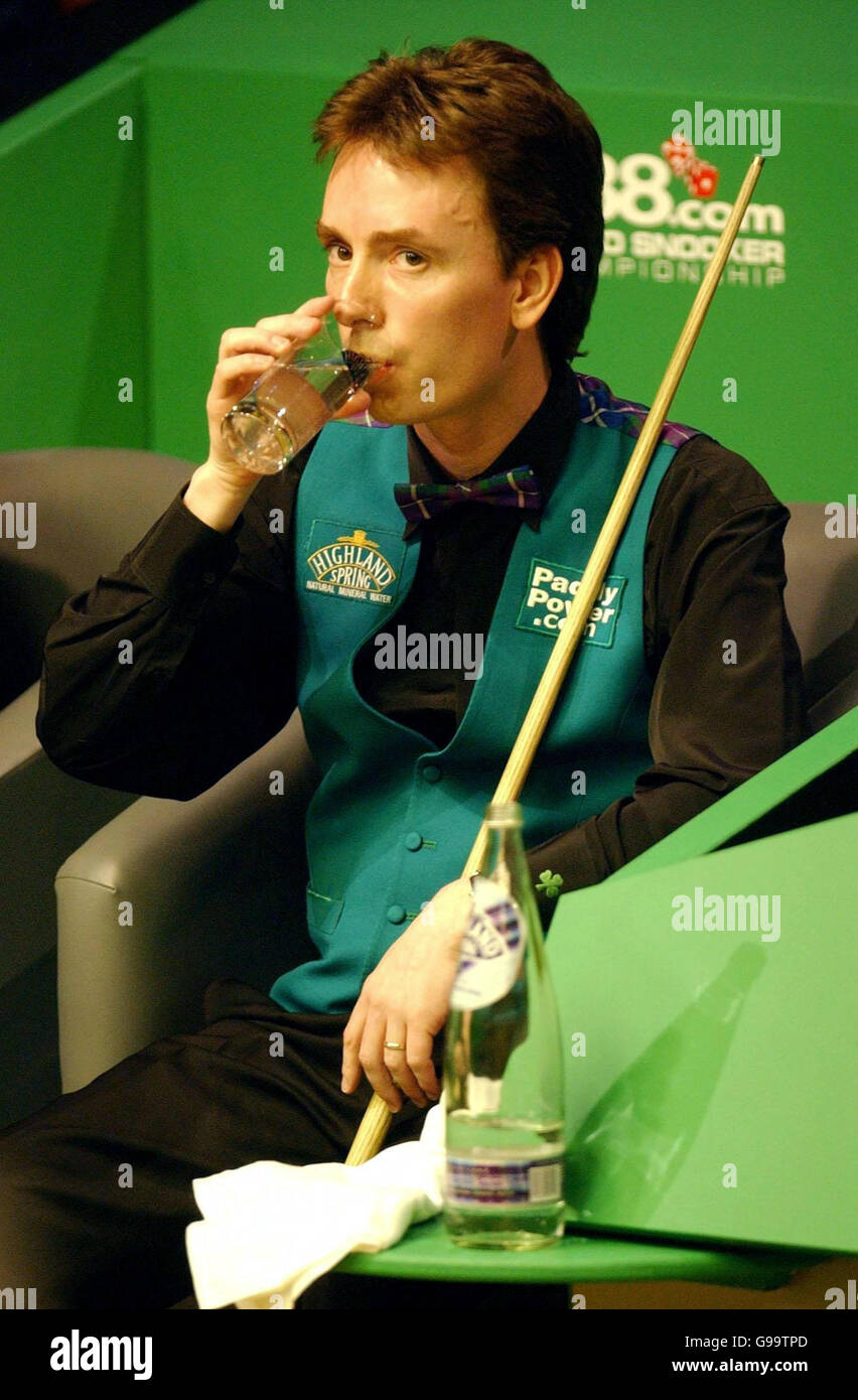 Ken Doherty takes a drink during the second round match against Matthew ...