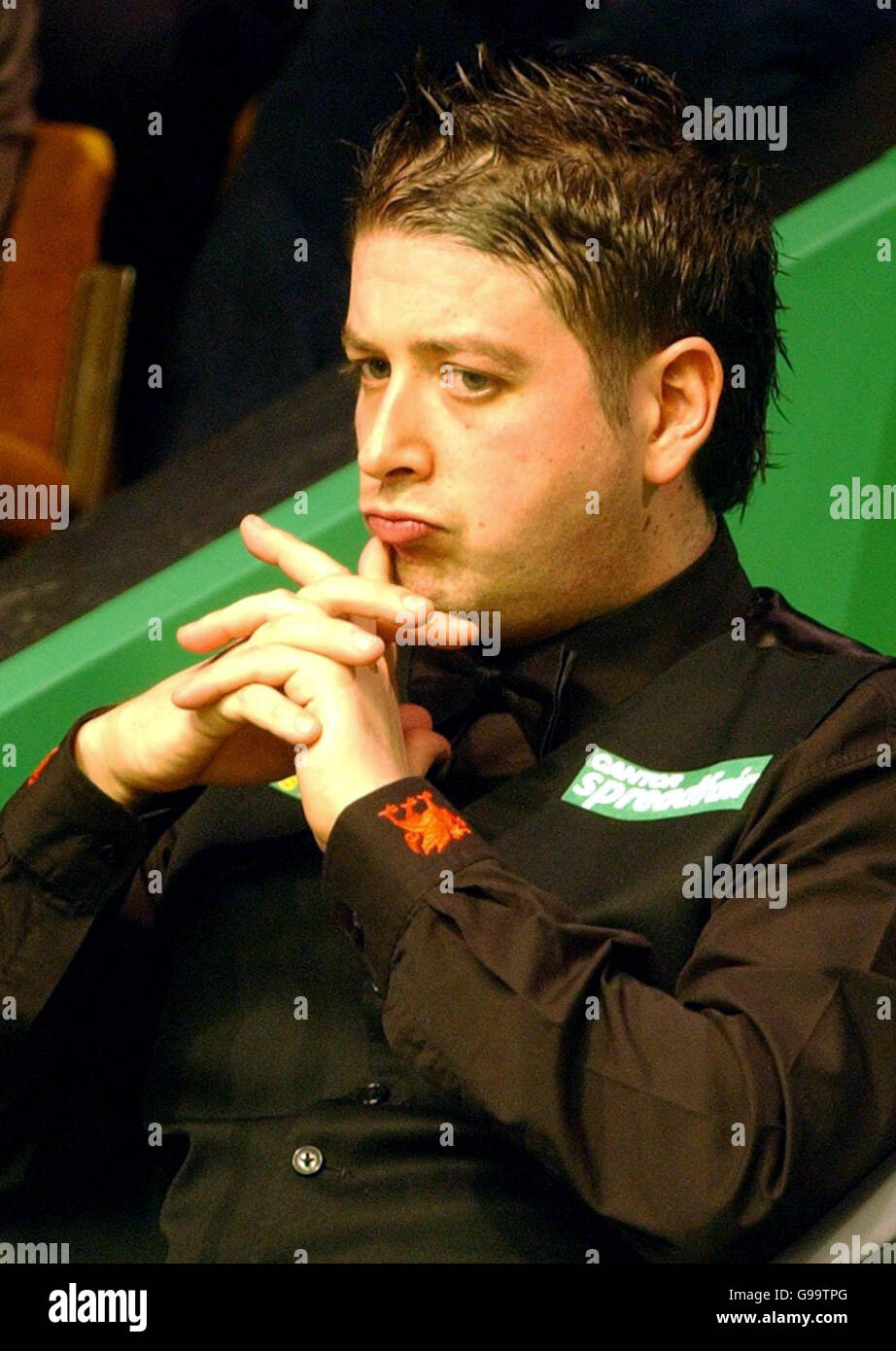Matthew Stevens looks on from his seat during the second round match ...